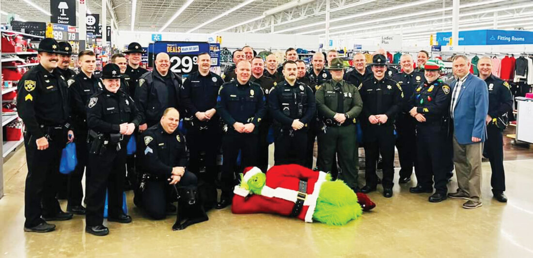 Shop With a Cop: Officers take children to buy clothes, toys and gifts ...